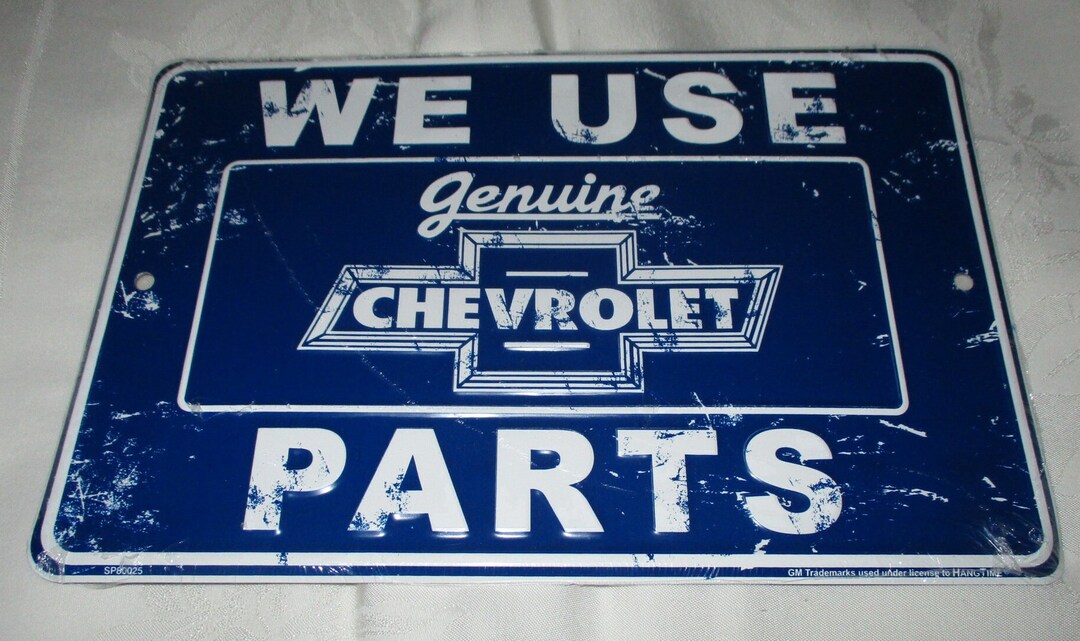 We Use GENUINE CHEVY PARTS Embossed Metal Sign - New - Etsy