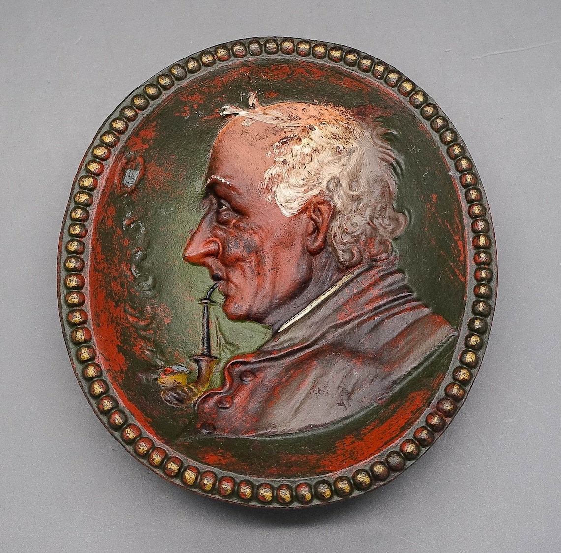 antique-bradley-hubbard-iron-pipe-smoking-man-ashtray-footed-card