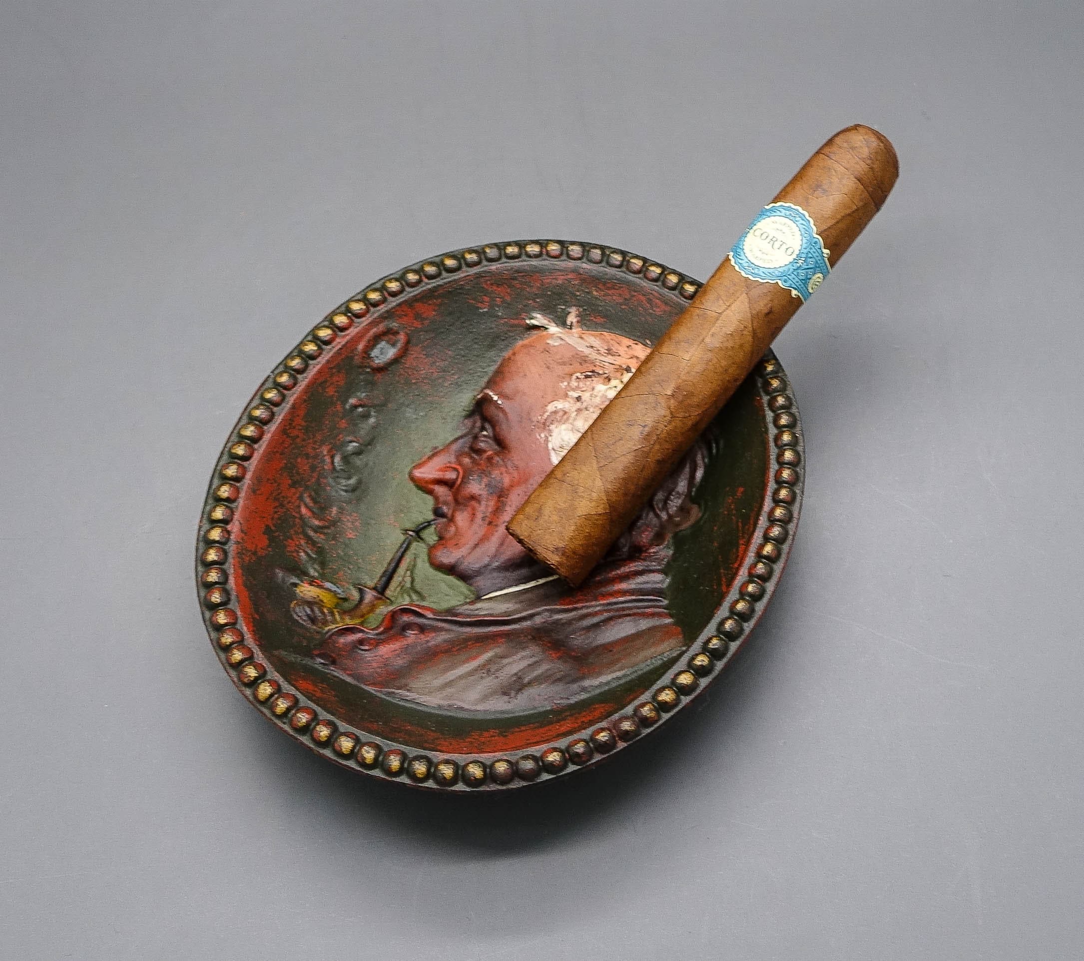 antique-bradley-hubbard-iron-pipe-smoking-man-ashtray-footed-card