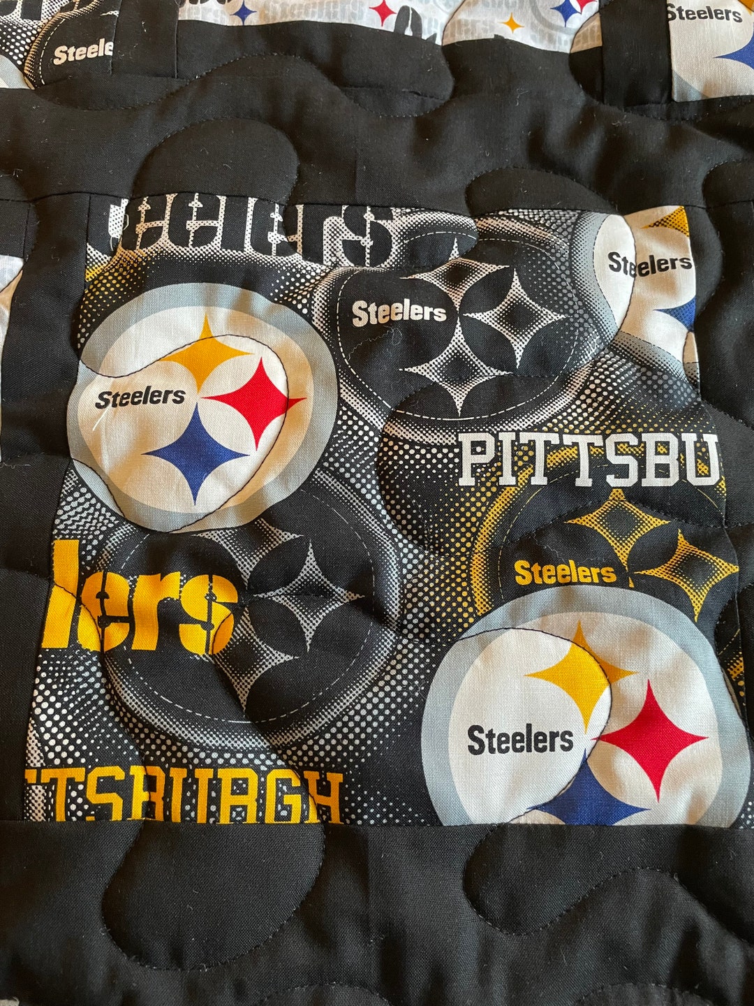 Two Brightly Colored Pittsburg Steelers Themed Fabric Are Combined to ...