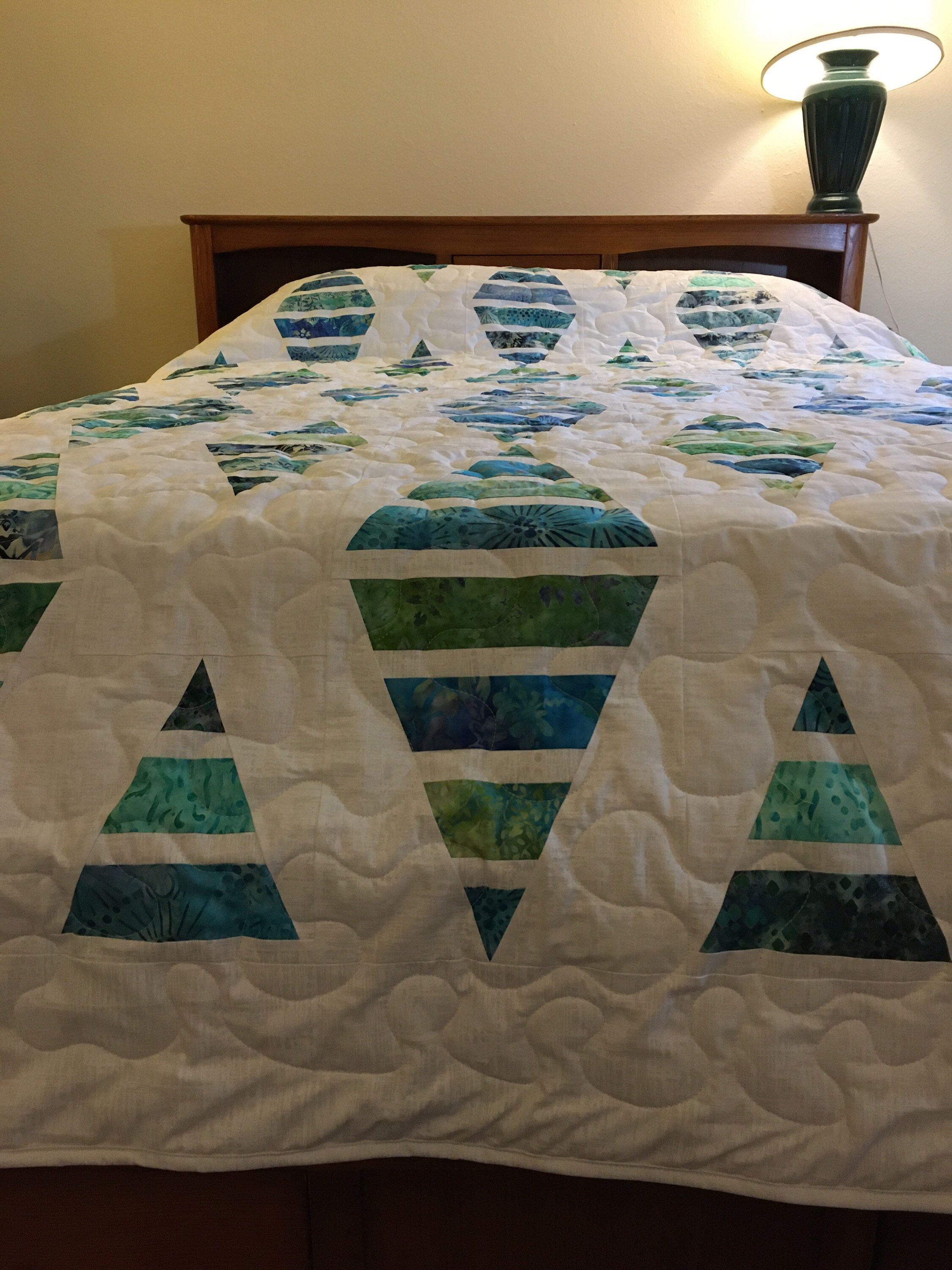 Multi colored batiks fabrics are blended with white to finish | Etsy