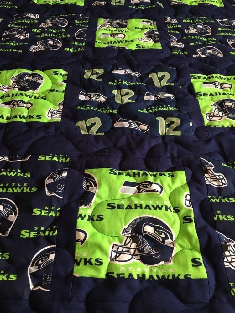 Seattle seahawks licensed fabrics are featured in this twin | Etsy