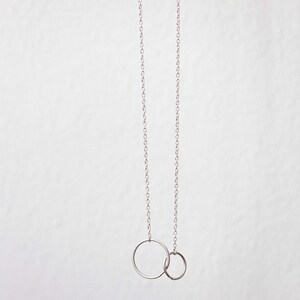 Two Entwined Tiny Circles Necklace in Sterling Silver or Gold - Etsy