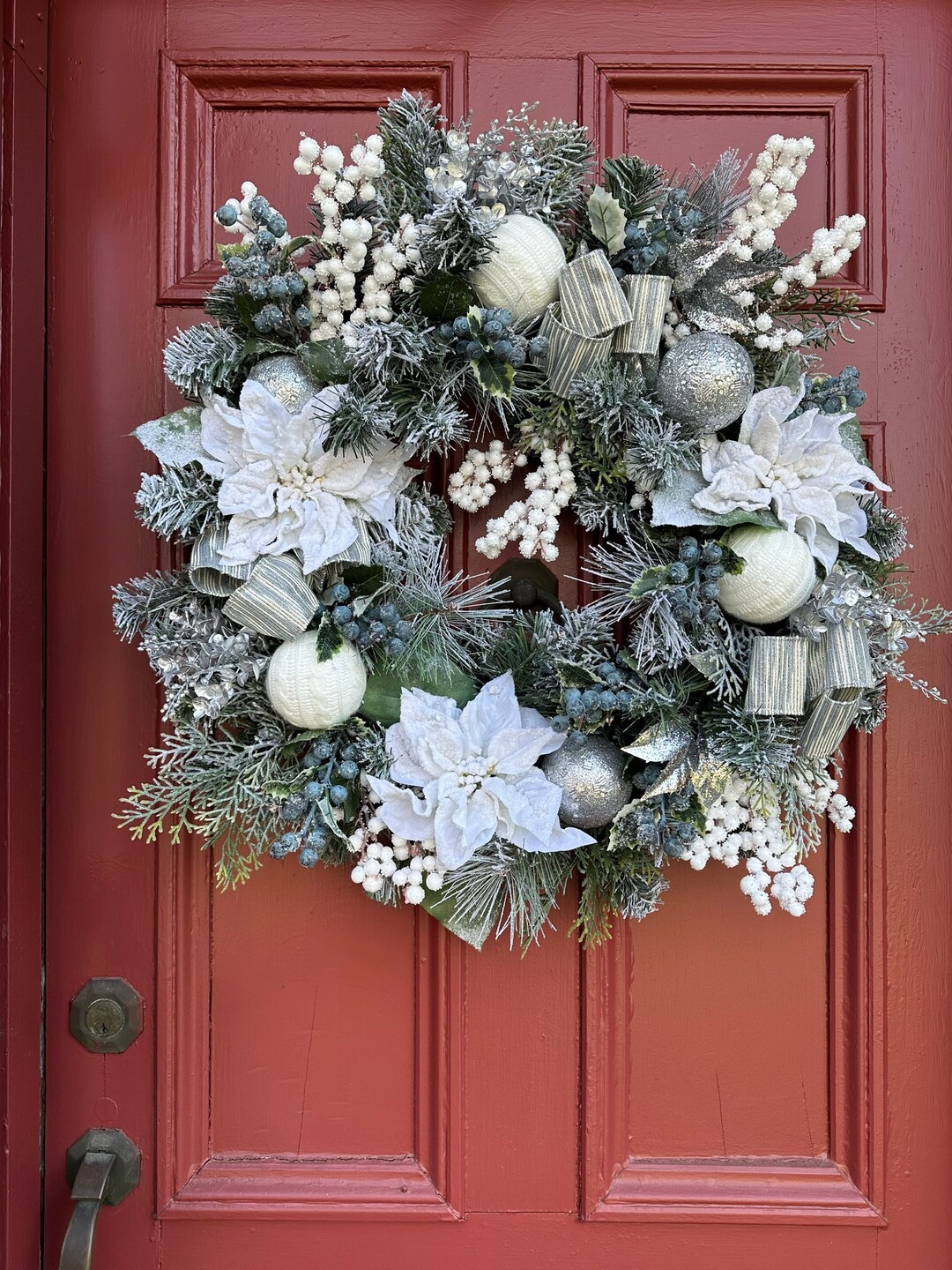 Snowy Winter Wreath. Flocked White Poinsettias With Snow Dusted Greens ...