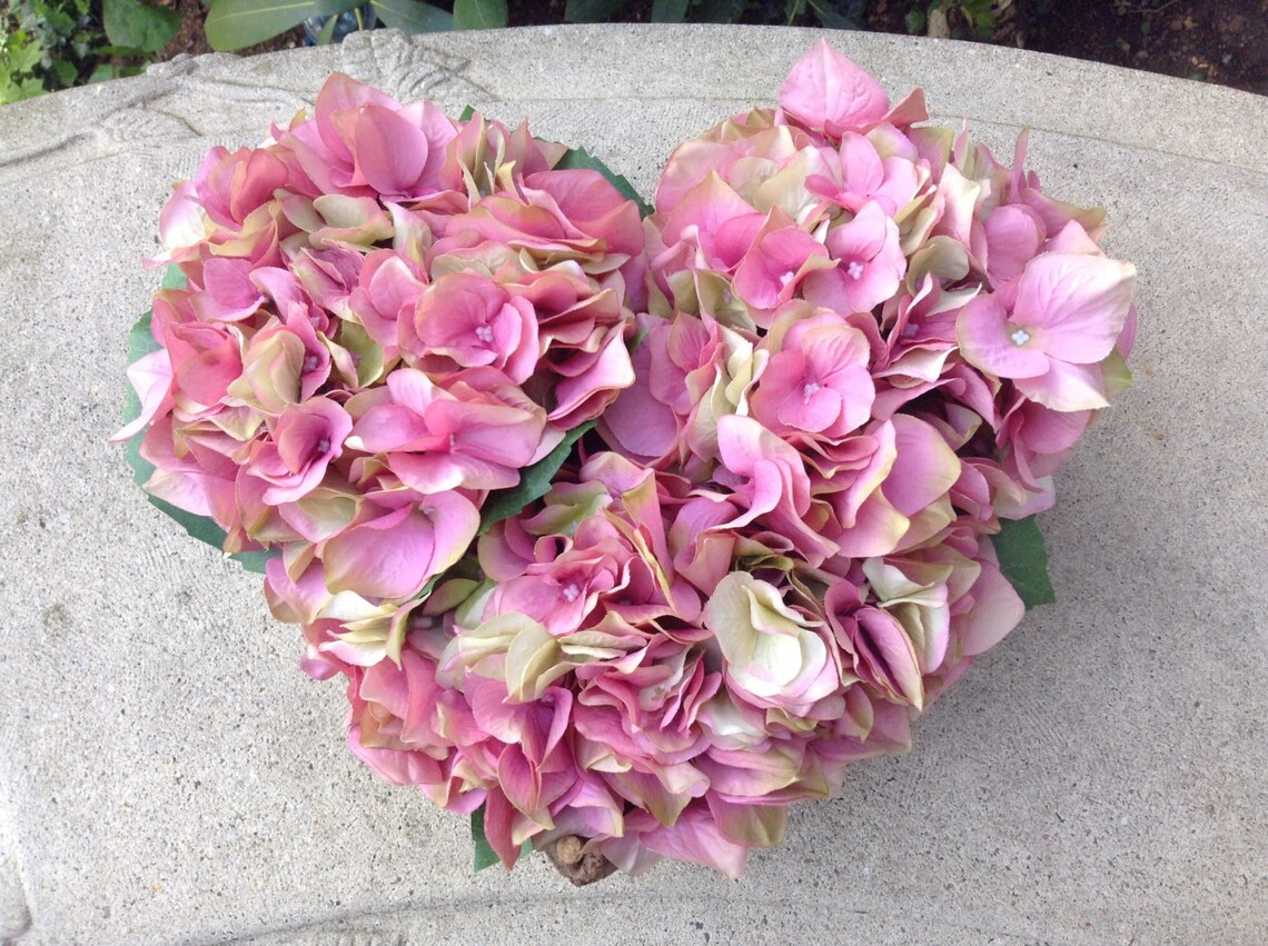 Heart Shaped Rustic Twig Basket Filled With Pink Hydrangeas. Premium ...