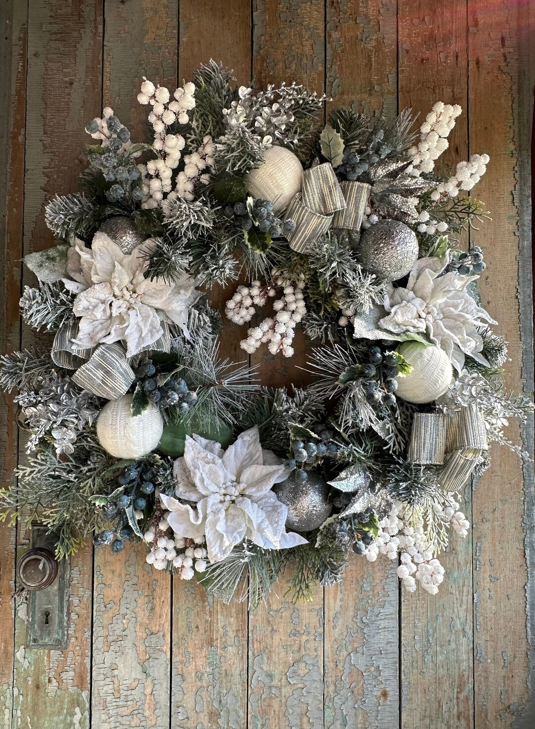 Snowy Winter Wreath. Flocked White Poinsettias With Snow Dusted Greens ...