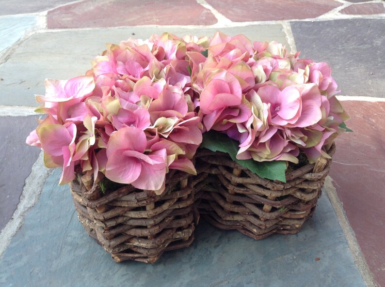 Heart Shaped Rustic Twig Basket Filled With Pink Hydrangeas. Premium ...