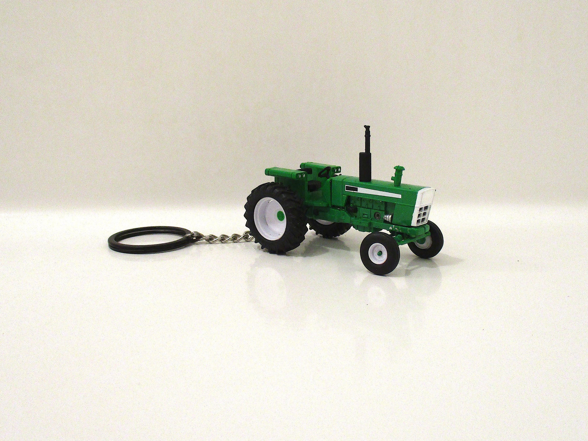 Green Farm Tractor 1974 Oliver Farm Equipment Open Cab Tractor, Man's ...