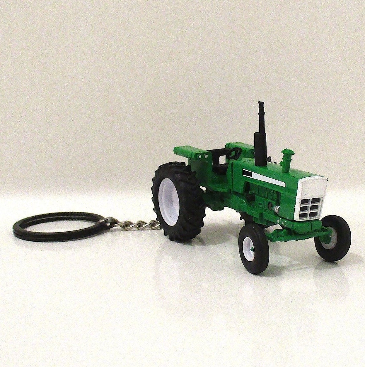 Green Farm Tractor 1974 Oliver Farm Equipment Open Cab Tractor, Man's ...