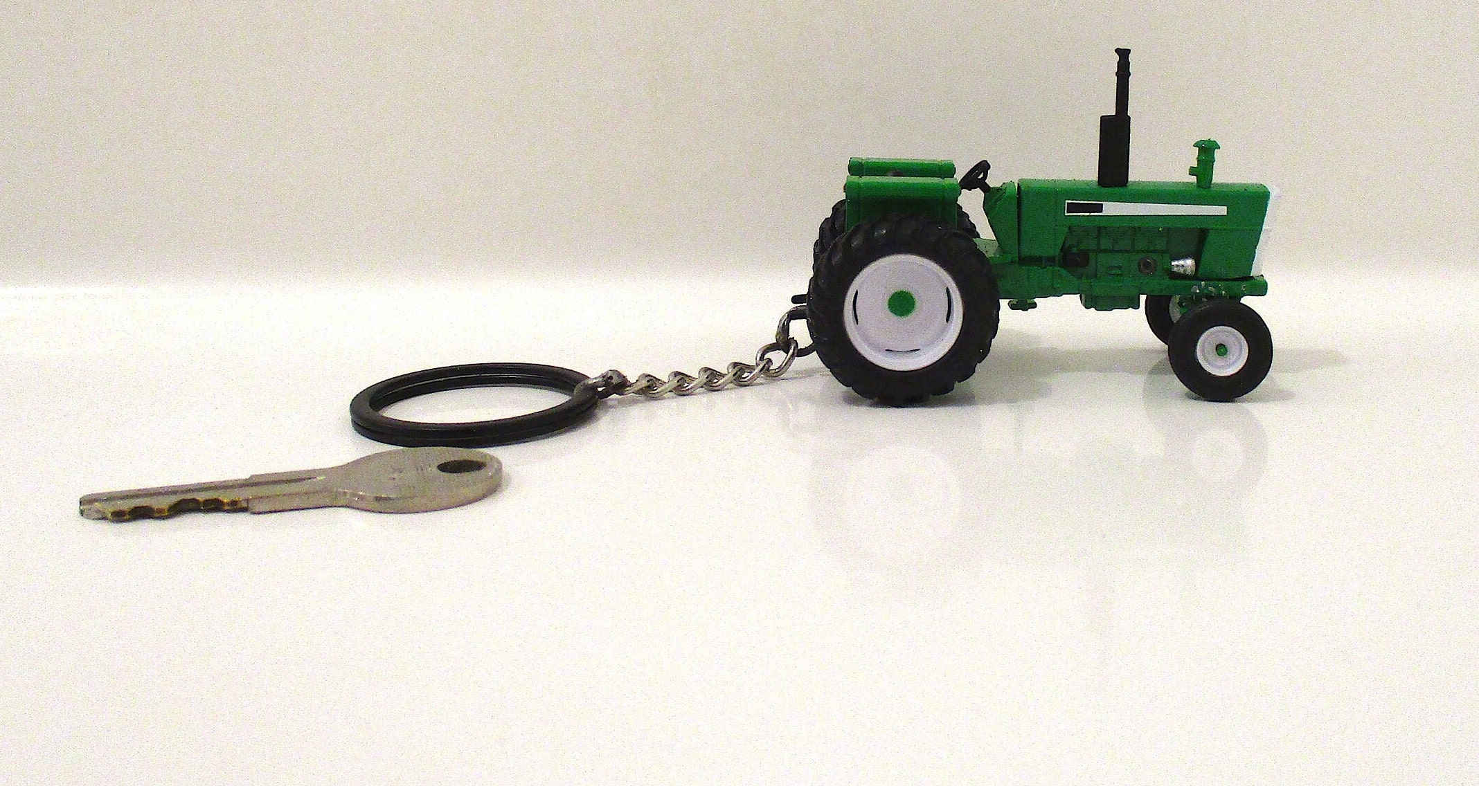 Green Farm Tractor 1974 Oliver Farm Equipment Open Cab Tractor, Man's ...