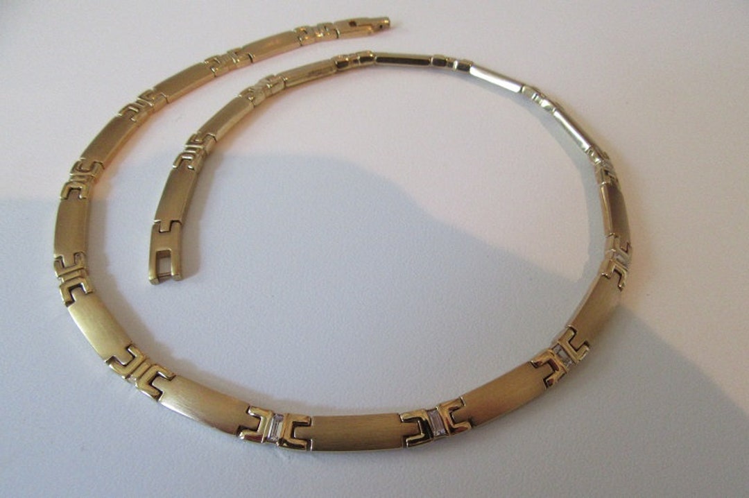 AURO Necklace in Brushed Gold-plated Steel and Baguette Rhinestones ...