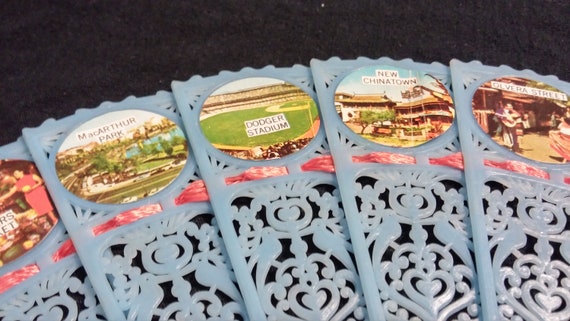 Hand Fan light blue plastic lattice work souvenir fan… - Gem