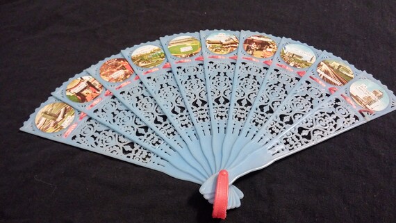 Hand Fan light blue plastic lattice work souvenir fan… - Gem
