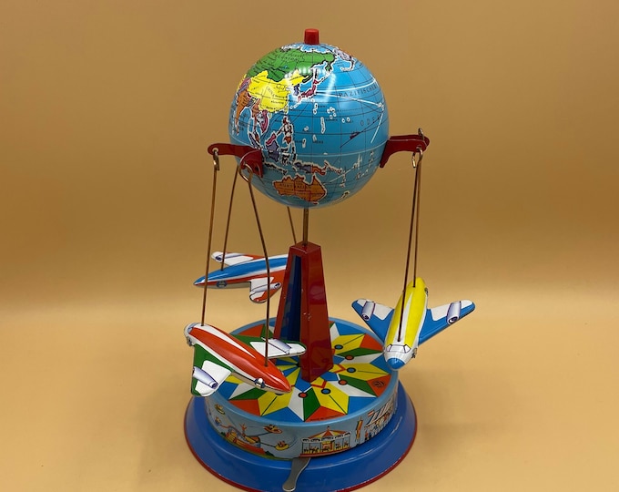 Vintage German Tin Toy 1990s Spinning Ride Tin Litho Carnival Rocket ...