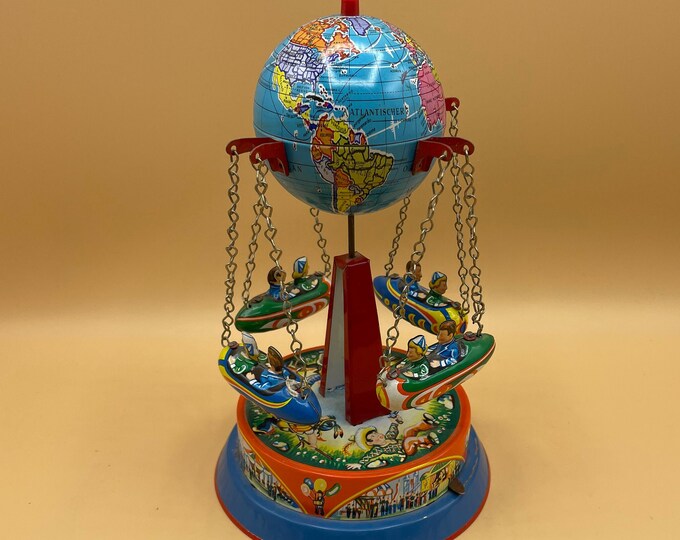 Vintage German Tin Toy 1990s Spinning Ride Tin Litho Carnival Rocket ...