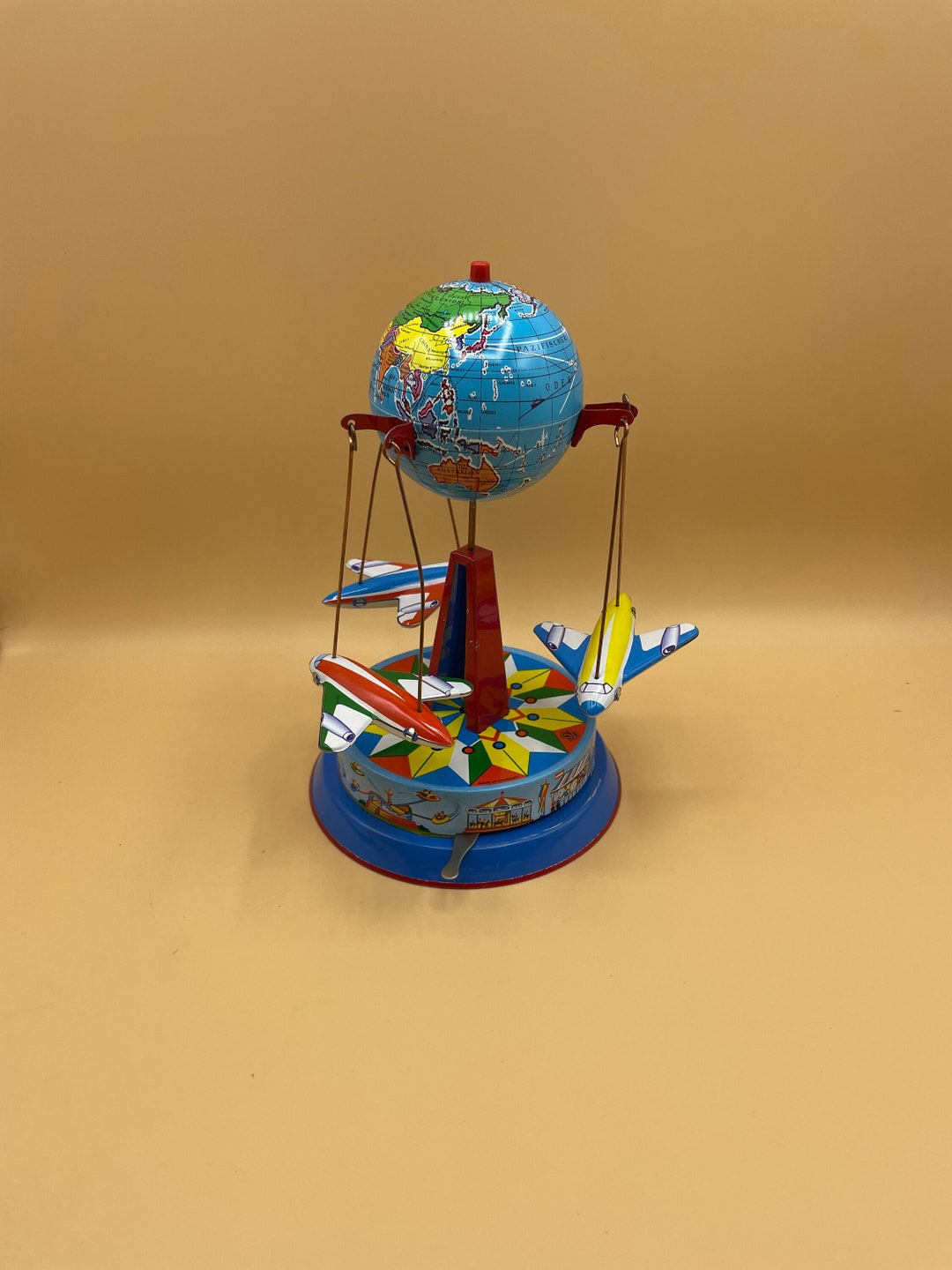 Vintage German Tin Toy 1990s Spinning Ride Tin Litho Carnival Rocket ...