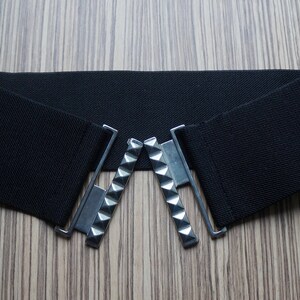 Wide Black Elastic Strap Cinch Belt, Metallic Silver Clasp, Figure ...