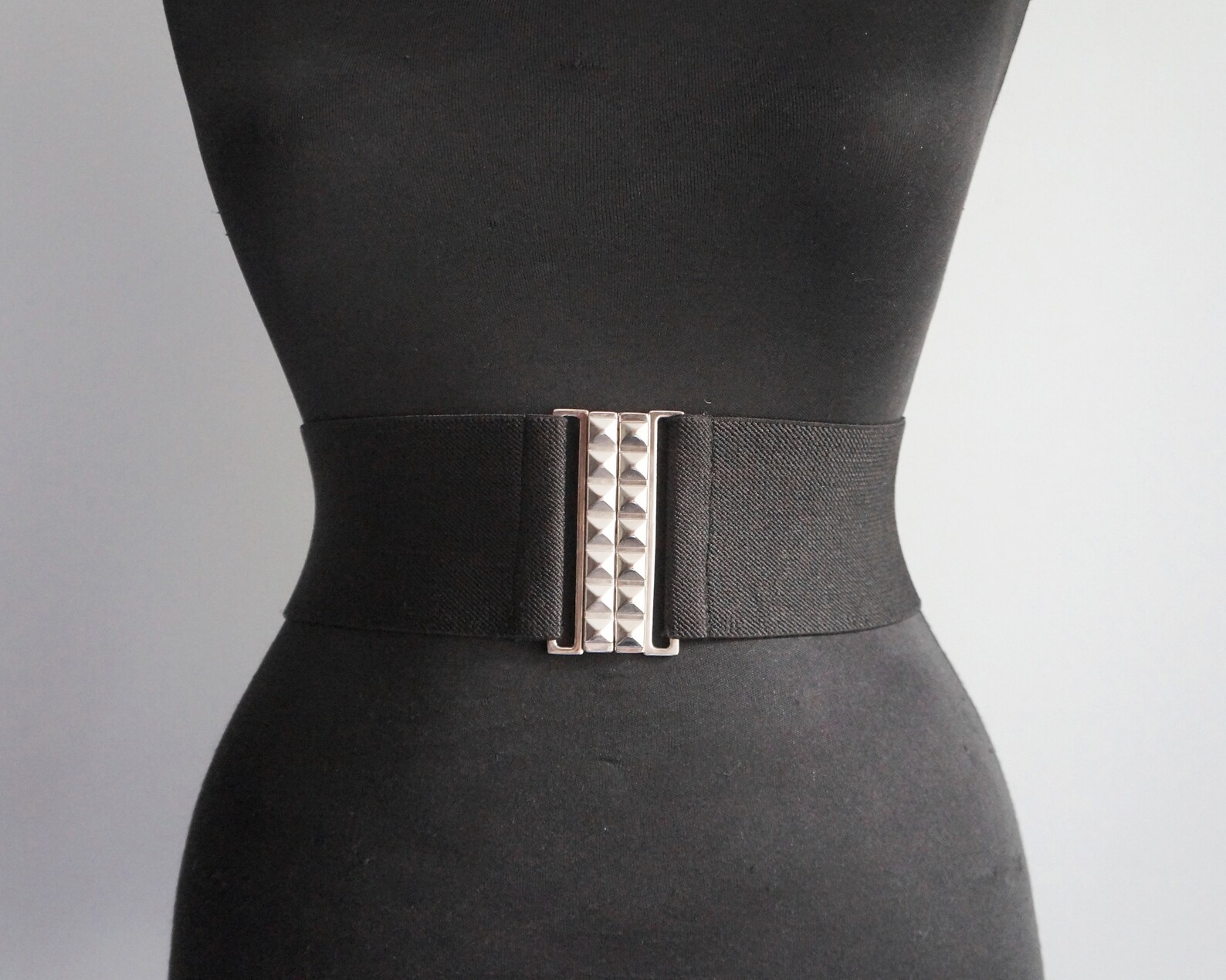 Wide Black Elastic Strap Cinch Belt, Metallic Silver Clasp, Figure ...