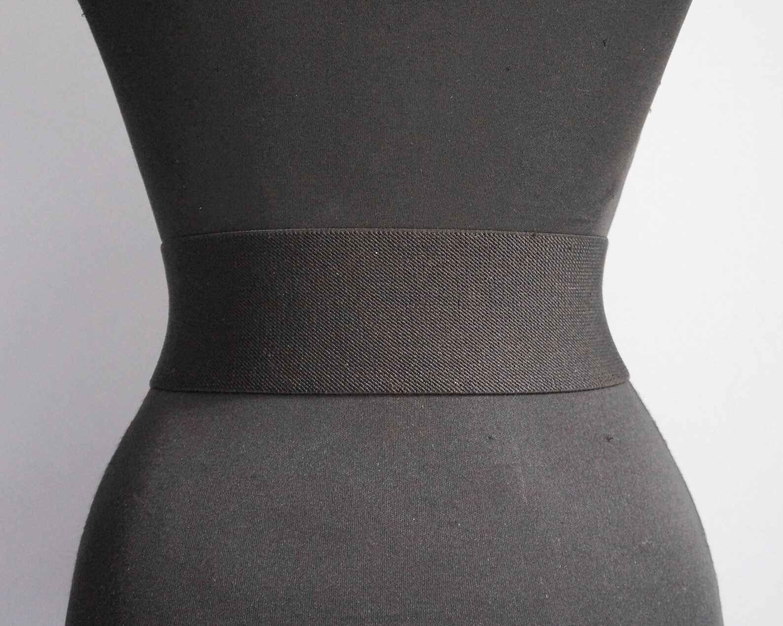 Wide Black Elastic Strap Cinch Belt, Metallic Silver Clasp, Figure ...