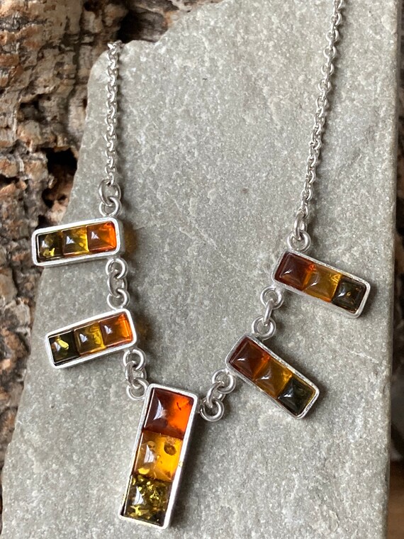 three coloured amber and - Gem