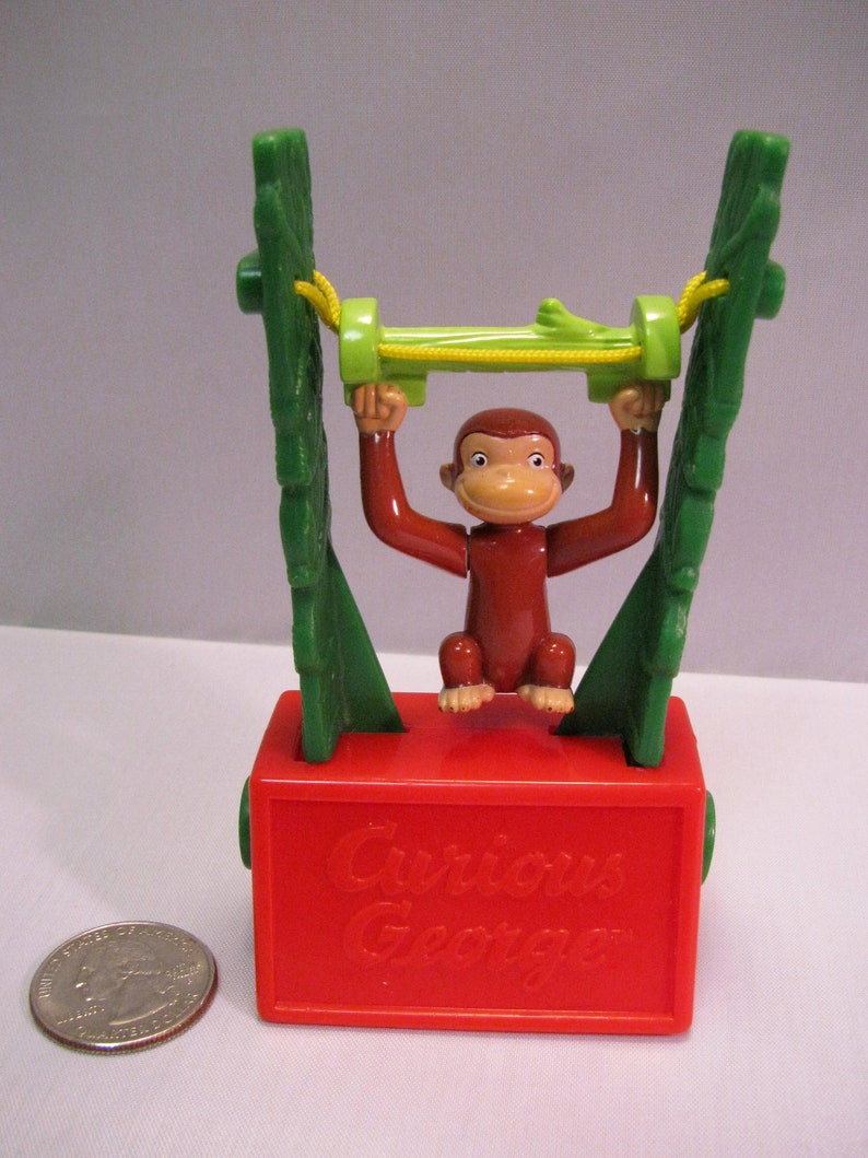Vintage Curious George Flip Toy Handheld Small Red and Green Plastic ...