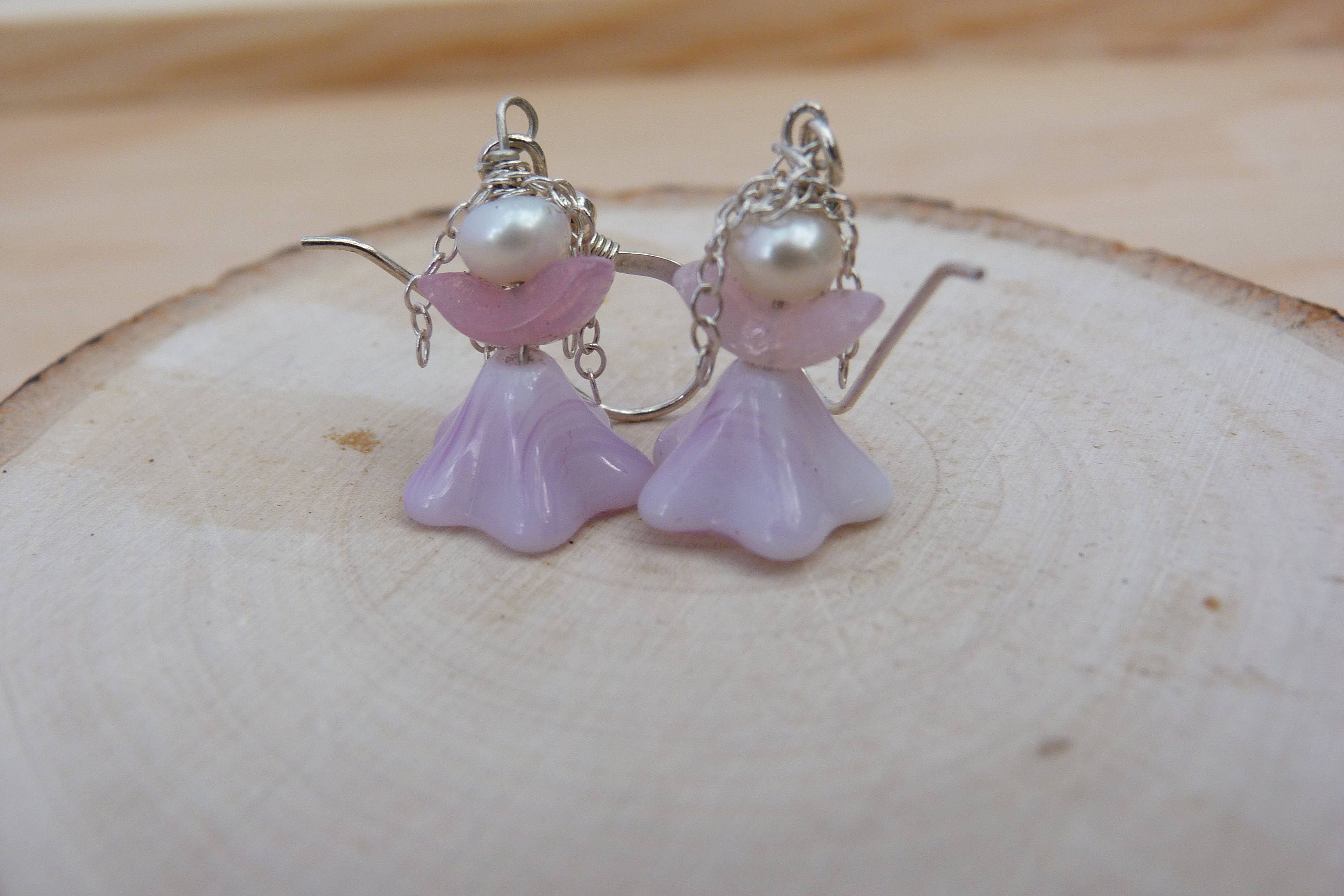 Tiny pink angels with sterling silver hair earrings - Etsy España