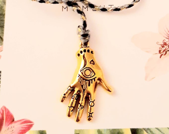 Talisman..amulette..grigri..main porte-bonheur oeil de chance ...