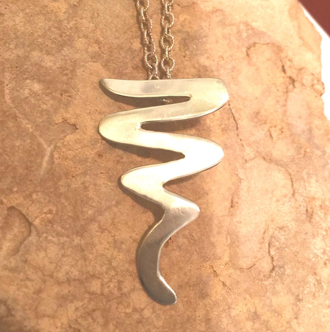 Whirlwind Tornado Pendant on Brown Woven Cord. Sterling Silver. - Etsy