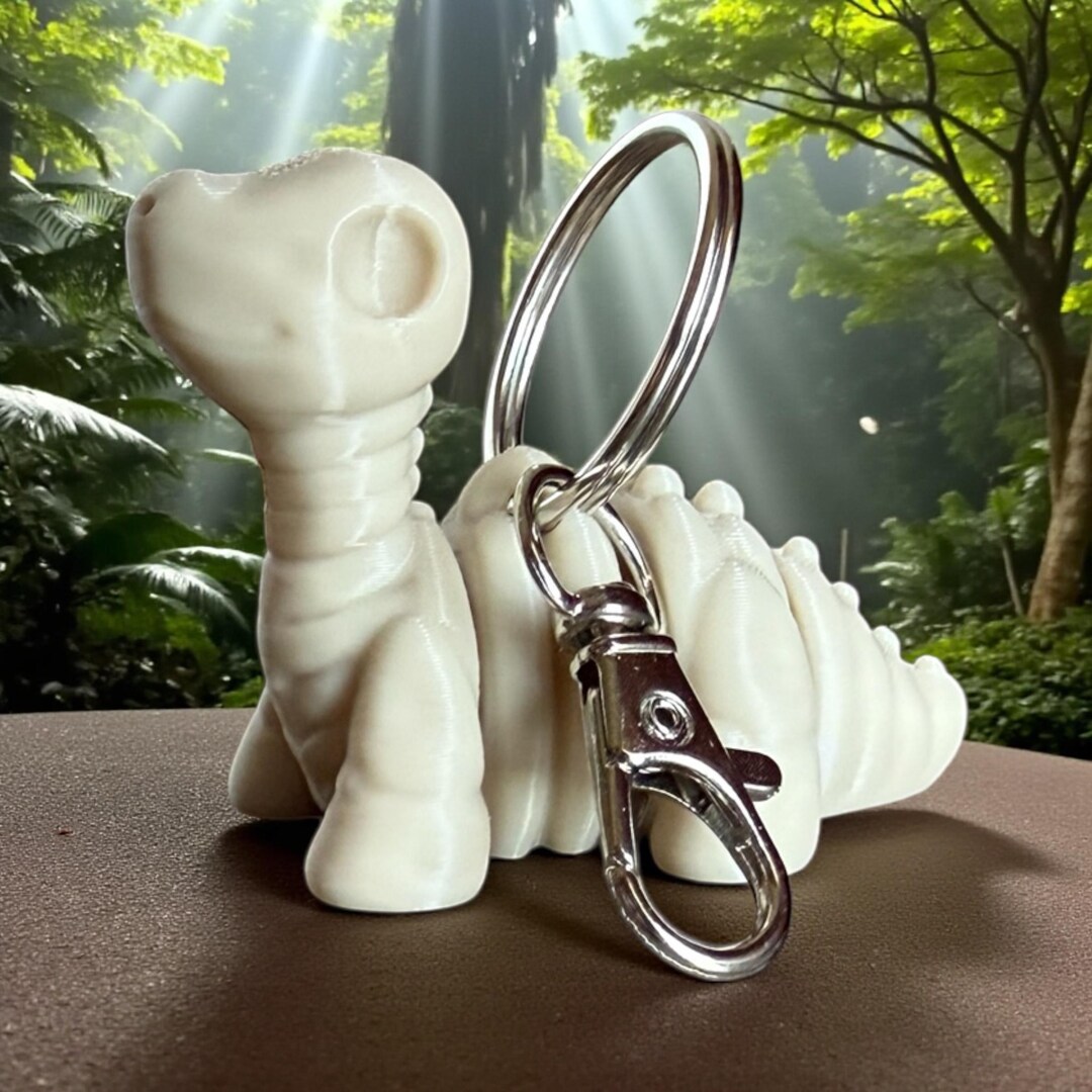 3D Printed Mini Dinosaur Skeleton Keychain | Articulated Dino Bones ...