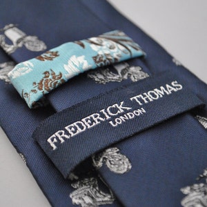 Navy Tie With Scooter Design With Signature Floral Design to the Rear ...