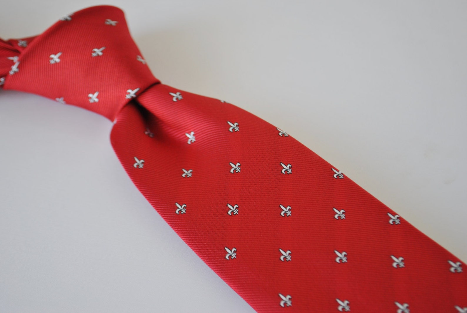Red Tie With Fleur De Lis Design With Signature Floral Design to Rear ...