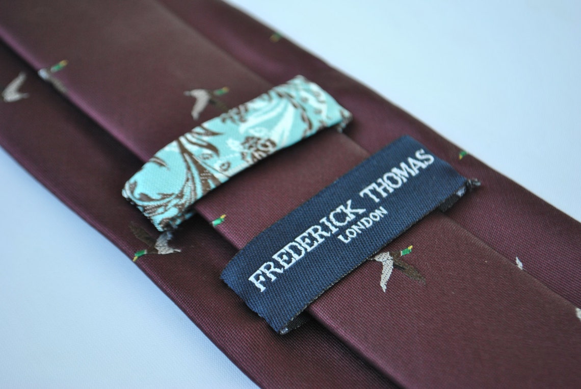 Maroon Tie With Flying Duck Design With Signature Floral Design to Rear ...