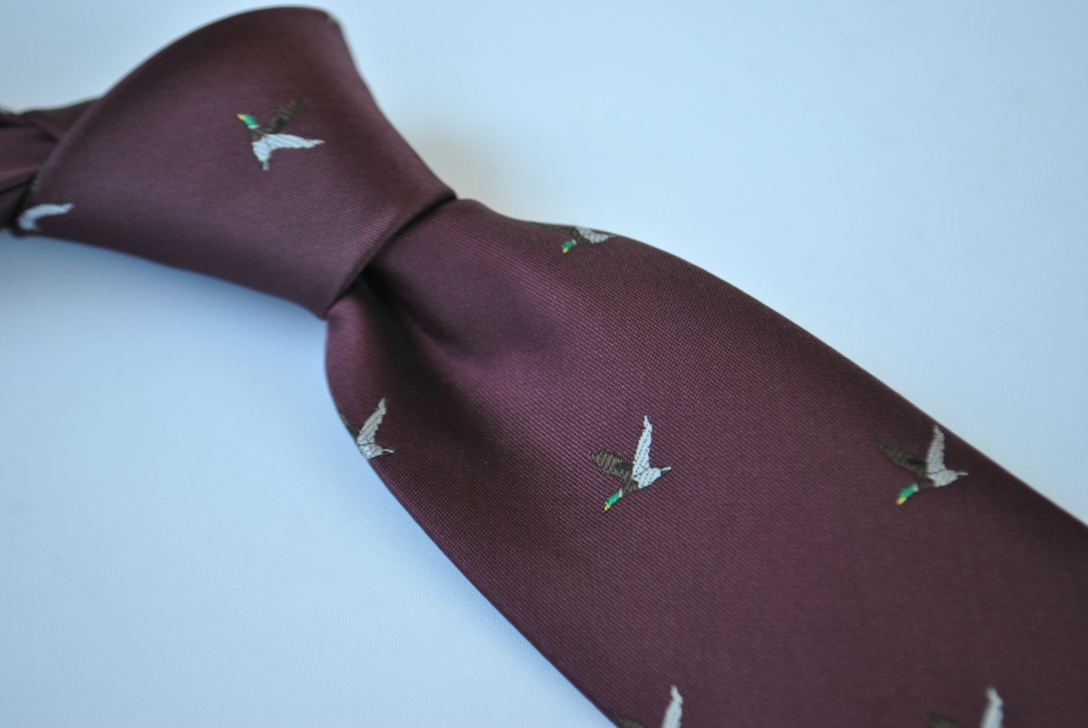 Maroon Tie With Flying Duck Design With Signature Floral Design to Rear ...