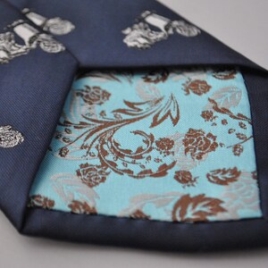 Navy Tie With Scooter Design With Signature Floral Design to the Rear ...