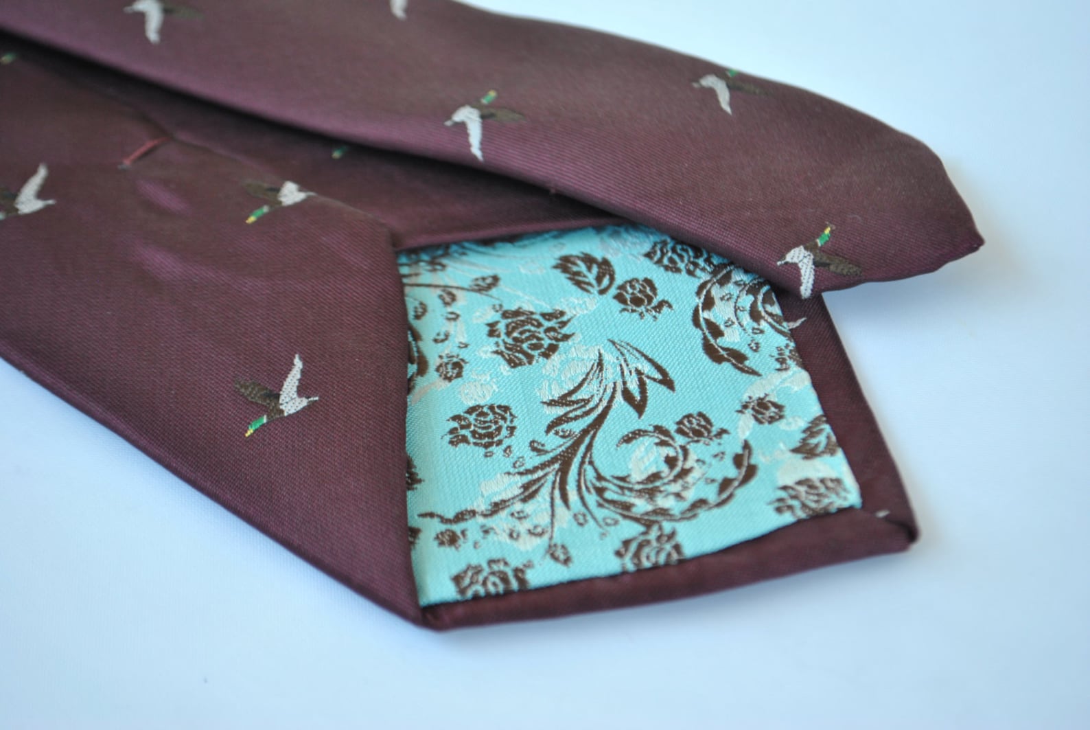 Maroon Tie With Flying Duck Design With Signature Floral Design to Rear ...