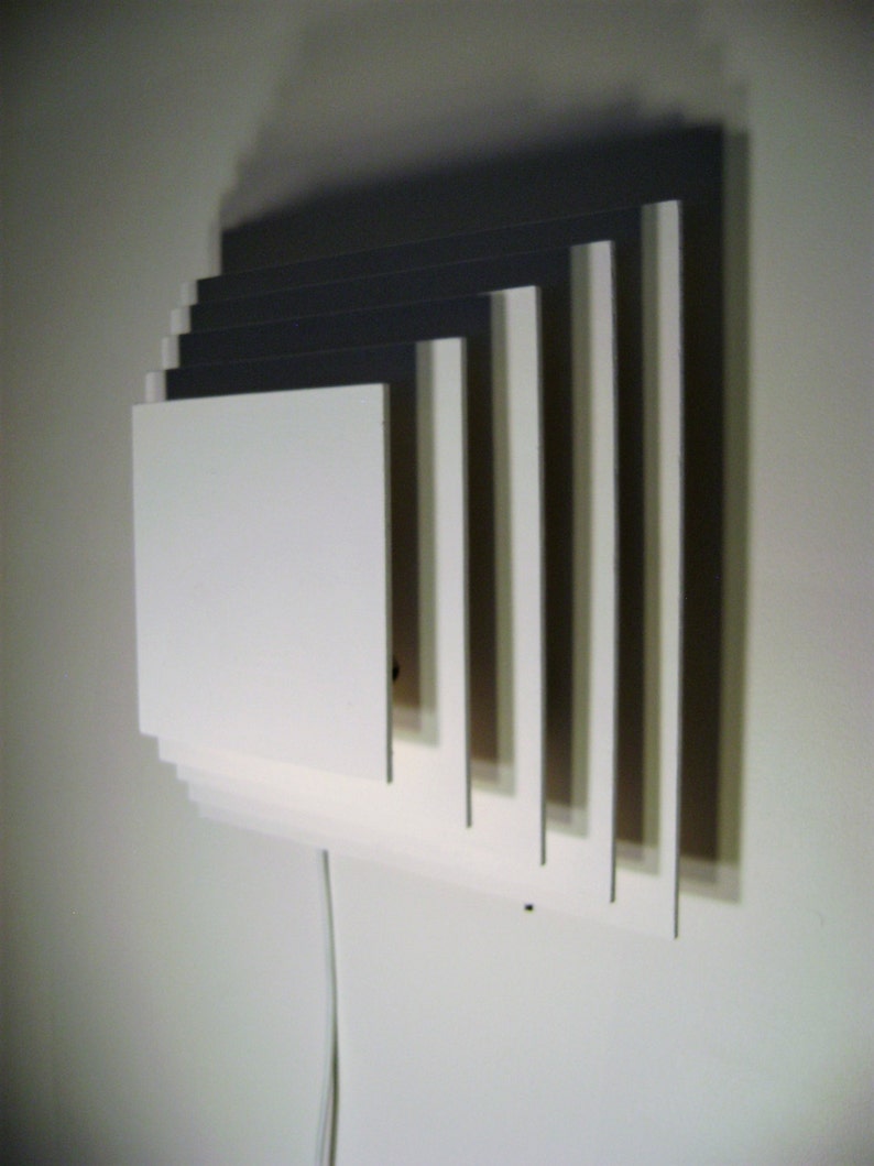 SOLD a Wood and LED Constructed Wall Light Sculpture Remote - Etsy
