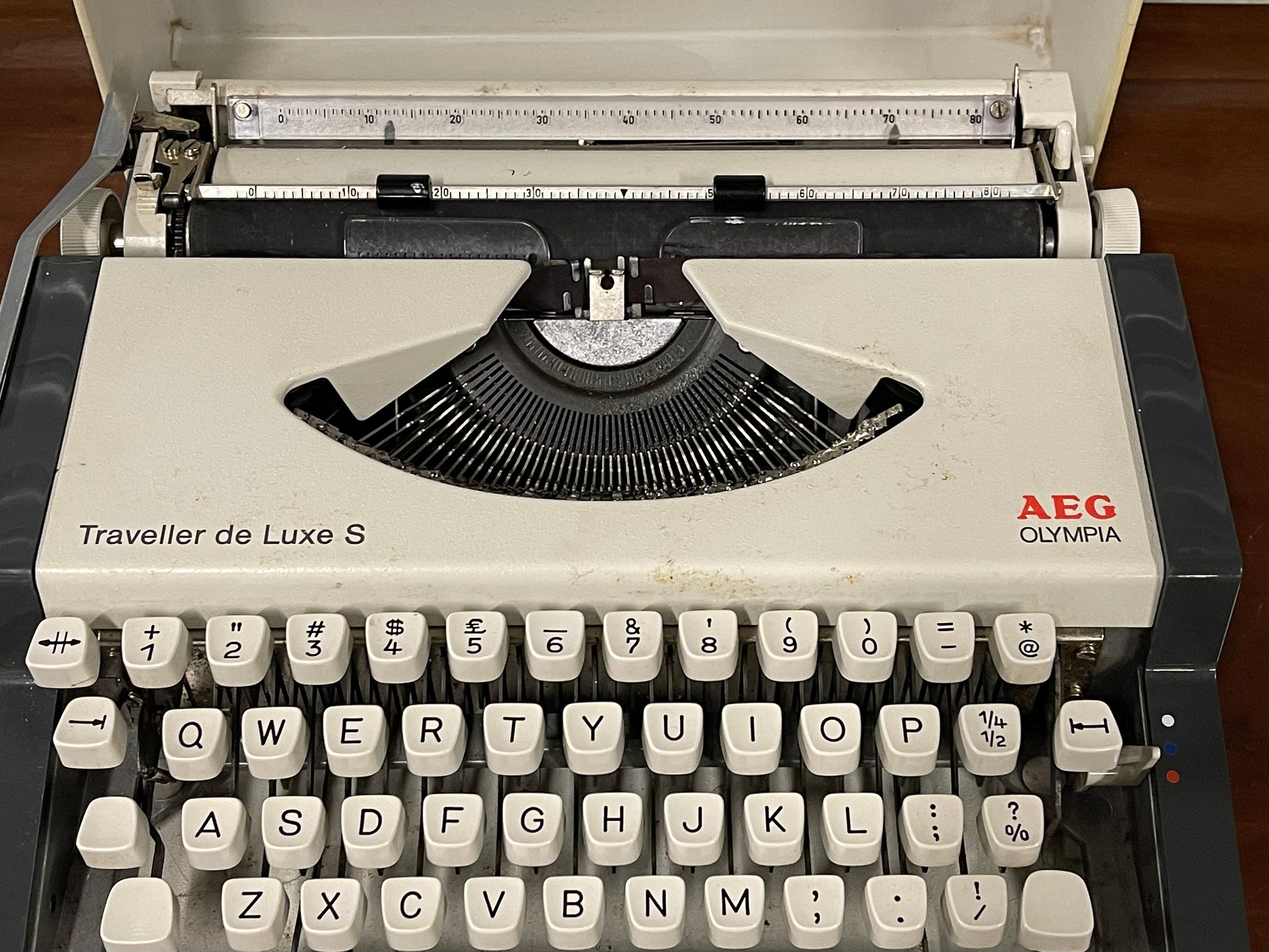 Vintage Olympia AEG Traveller De Luxe Typewriter With Its Original Case