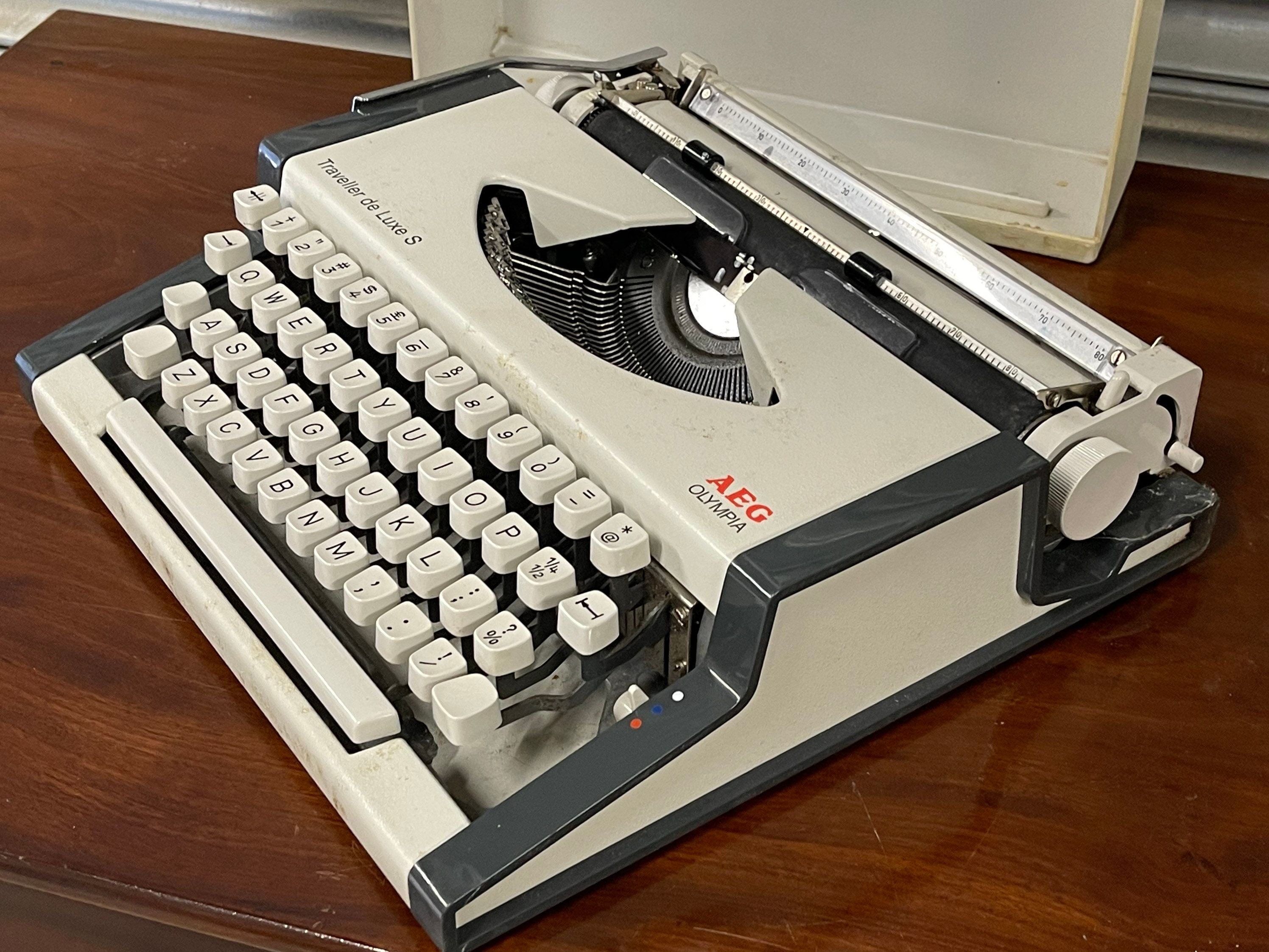 Vintage Olympia AEG Traveller De Luxe Typewriter With Its Original Case