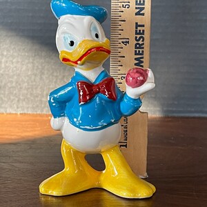 1960's Walt Disney Prod., Ceramic Angry Donald Duck Holding an Apple ...