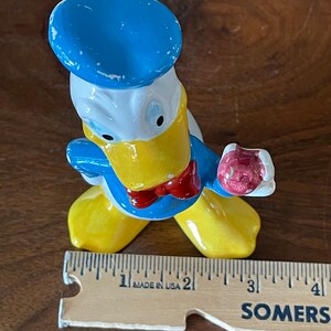 1960's Walt Disney Prod., Ceramic Angry Donald Duck Holding an Apple ...