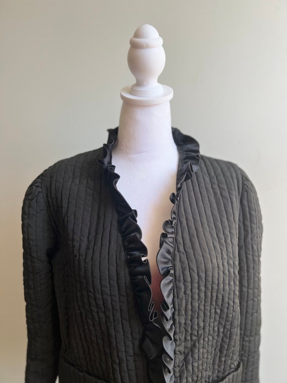 Black Quilted Jacket with Ruffle Detail. Versatile, A… - Gem