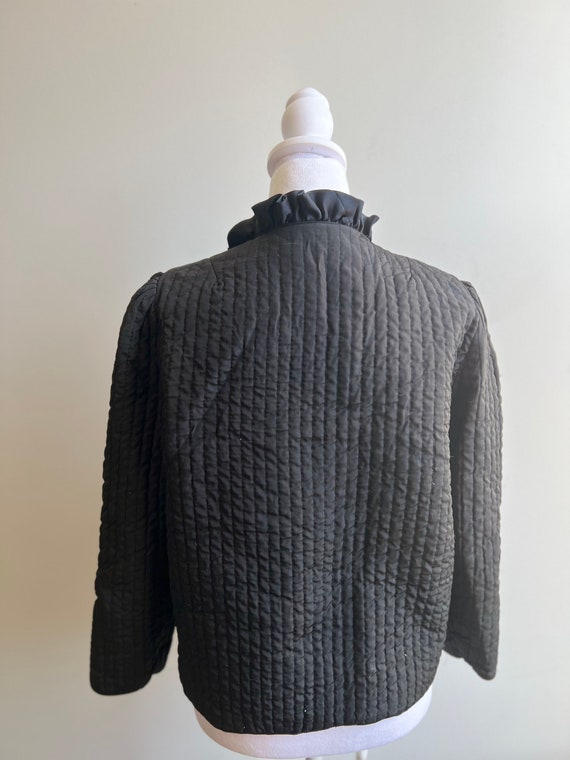 Black Quilted Jacket with Ruffle Detail. Versatile, A… - Gem