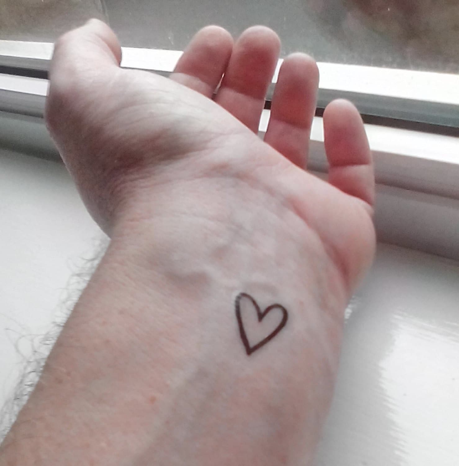 Heart Tattoos On Hand