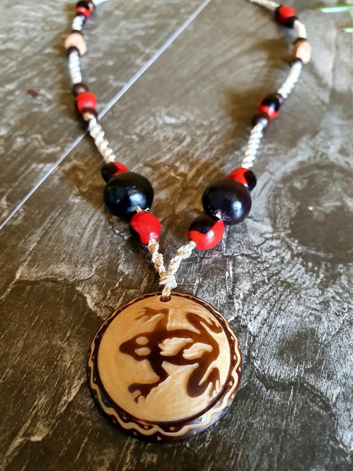 Indigenous made pendant necklace with Huayruro and Tagua | Etsy