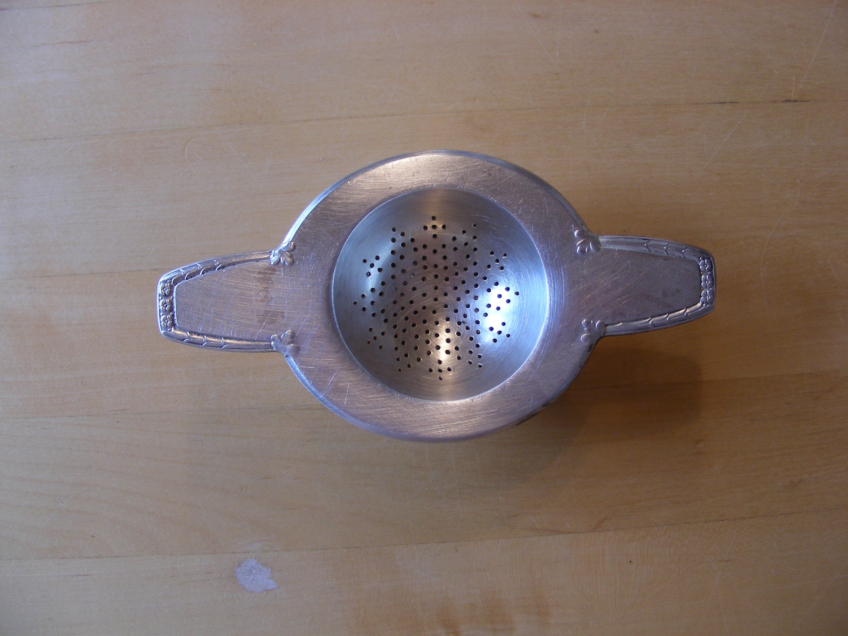 Vintage, double handled, tea strainer, tea sieve and rest
