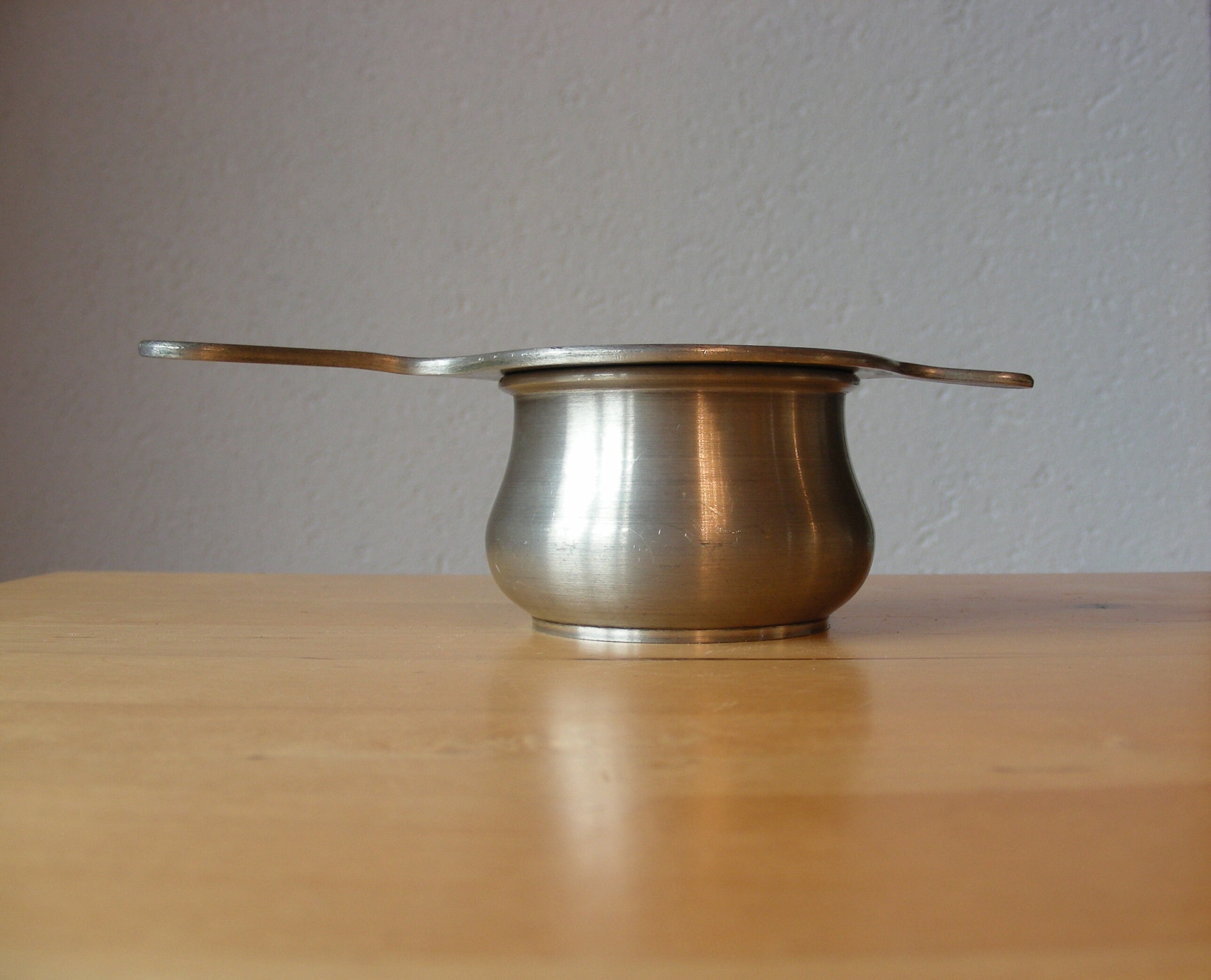 Pewter tea sieve, strainer with bowl