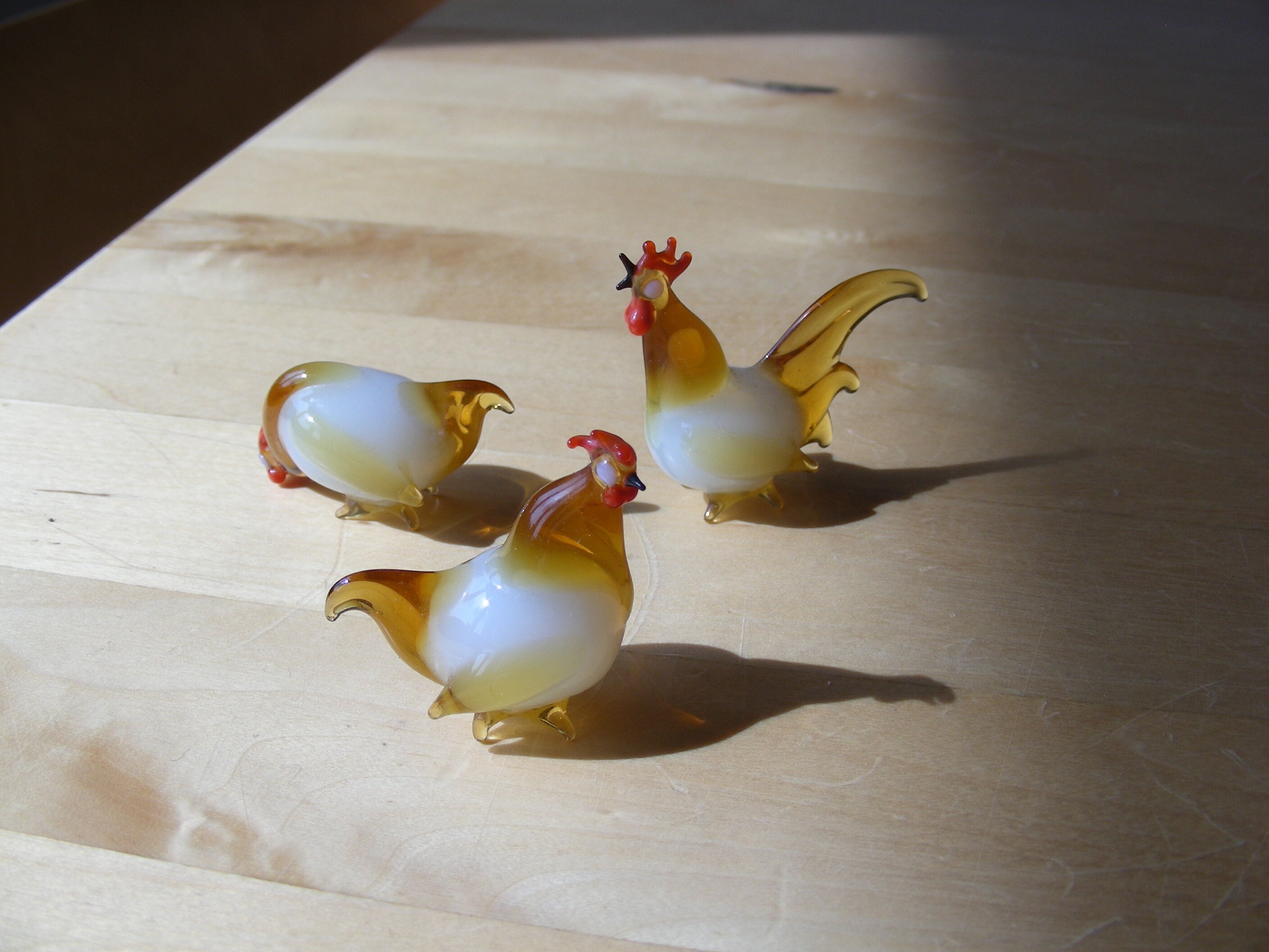 Vintage miniature glass chickens, most likely Murano