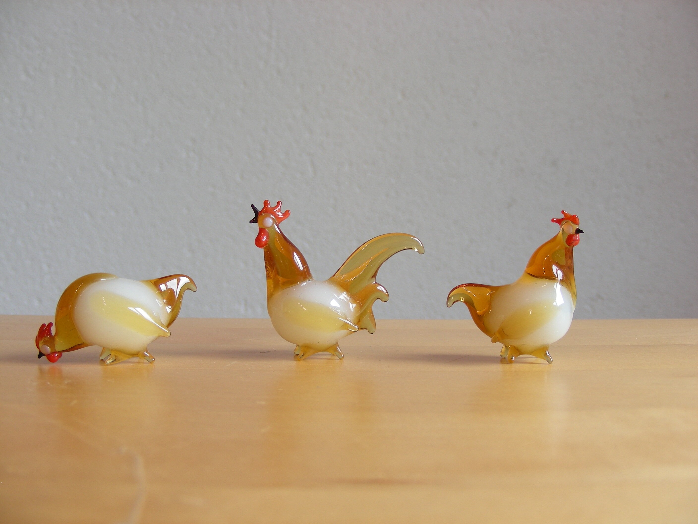 Vintage miniature glass chickens, most likely Murano