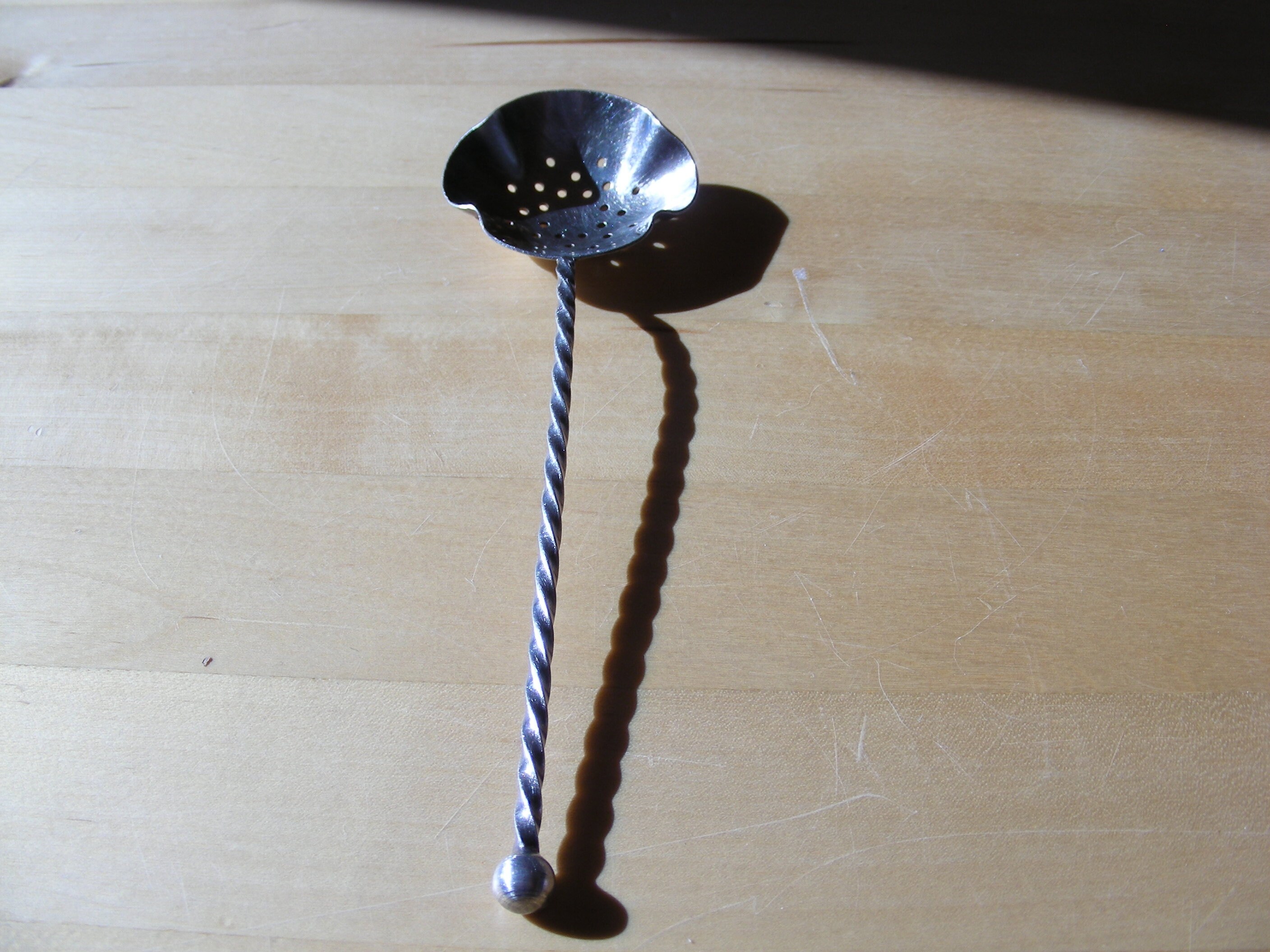 Long handled straining spoon, silver plated, vintage