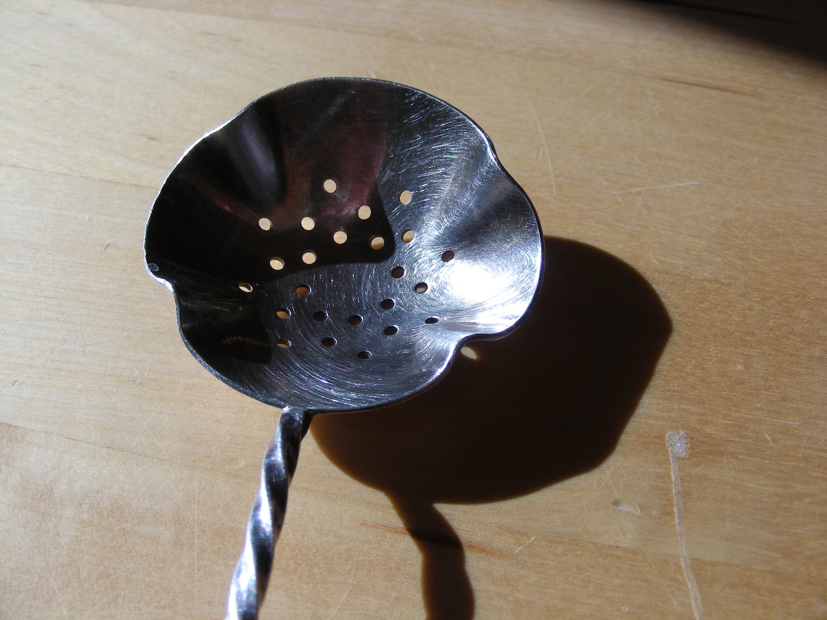 Long handled straining spoon, silver plated, vintage